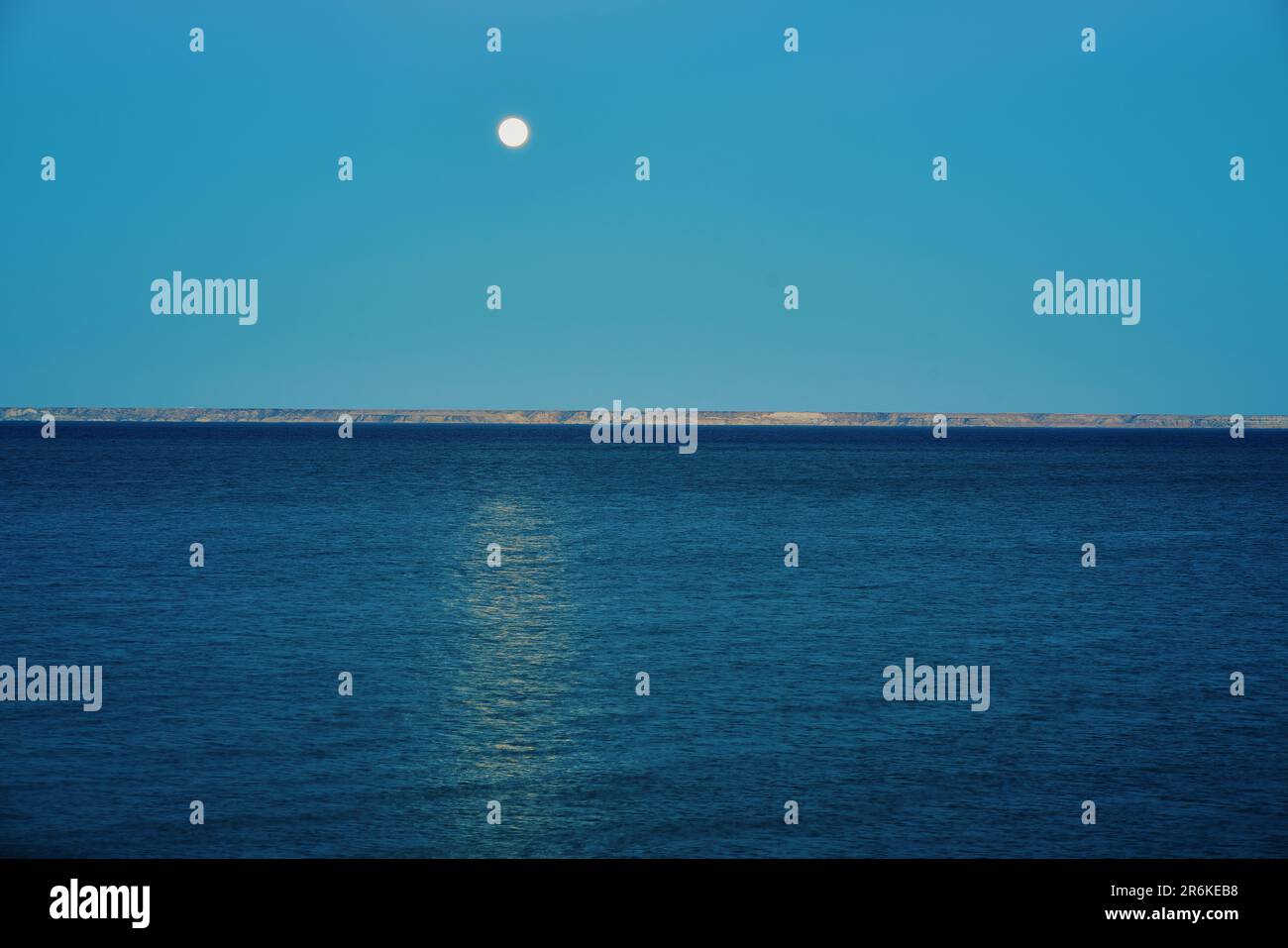 moon rising over the sea Stock Photo - Alamy
