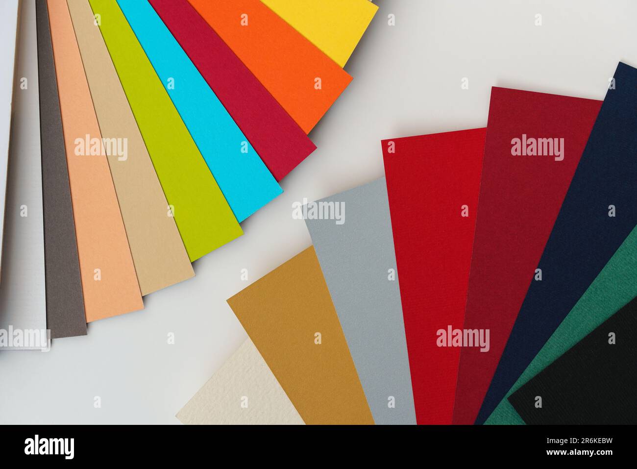 Colourful paper swatches on white desk, closeup detail Stock Photo - Alamy