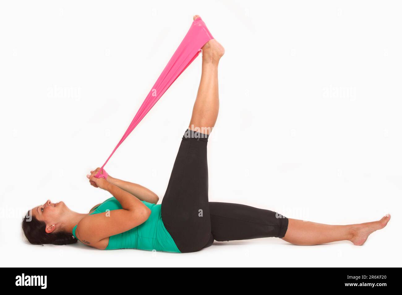 Woman, sport exercise with Thera-Band, sideways Stock Photo - Alamy