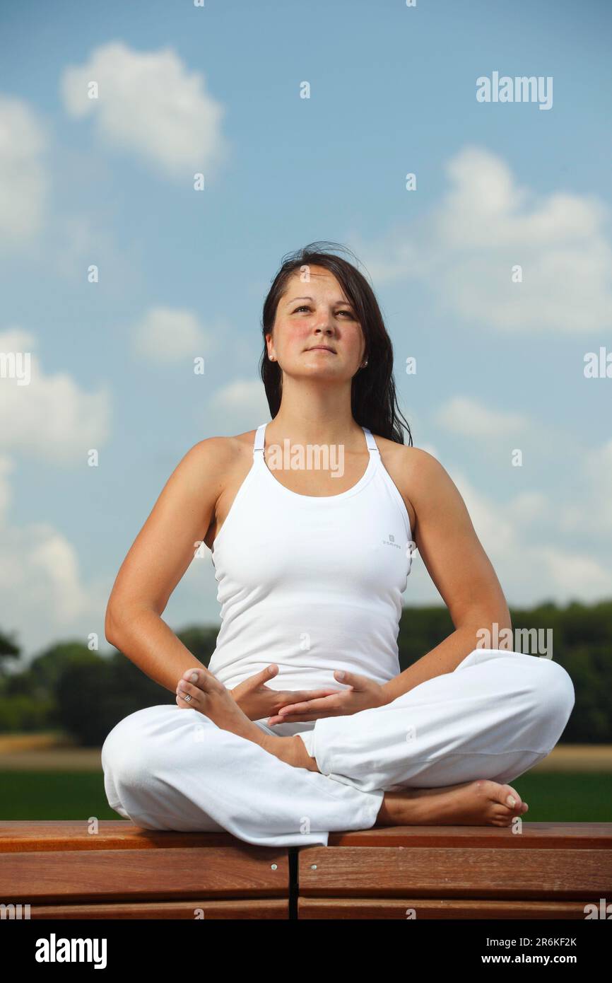 Half lotus yoga pose hi-res stock photography and images - Alamy
