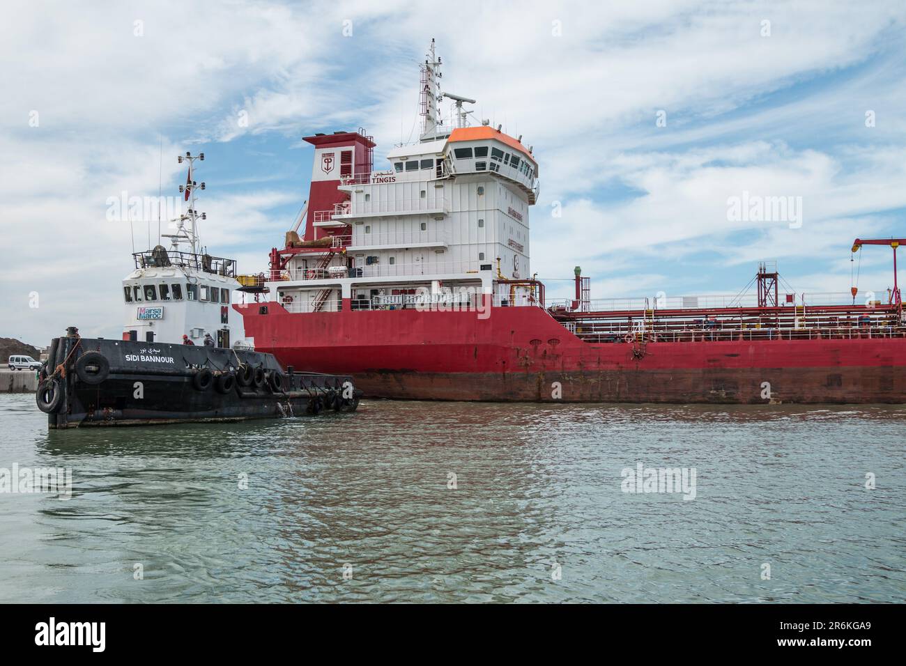 Ensuring Safe Passage: Tugboat Assisting in Ship Maneuvers at Laayoune ...
