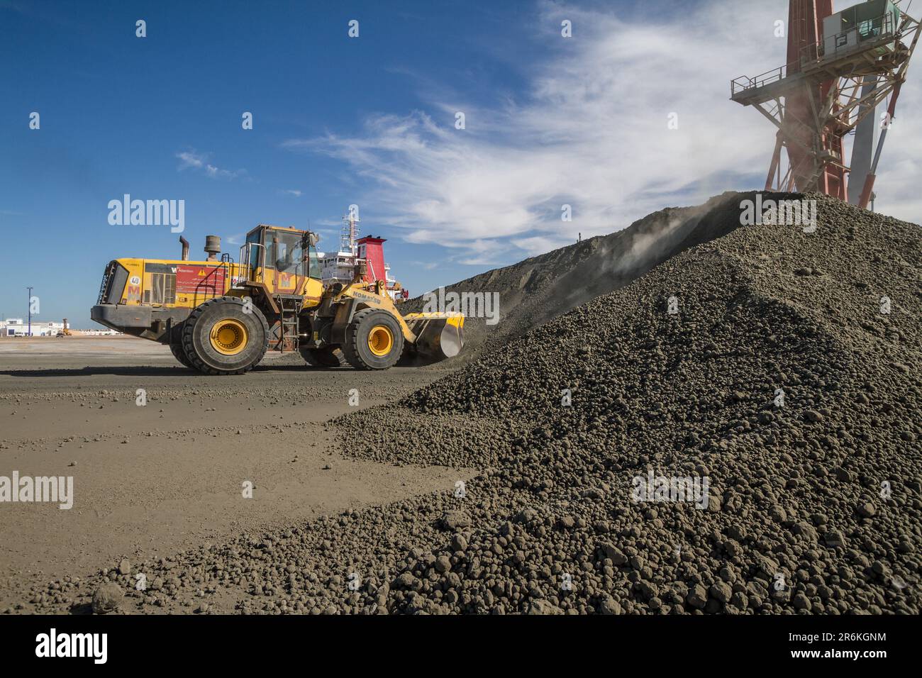 Port Logistics: Excavator Operating Cement Load at Laayoune's Bulk Quay ...