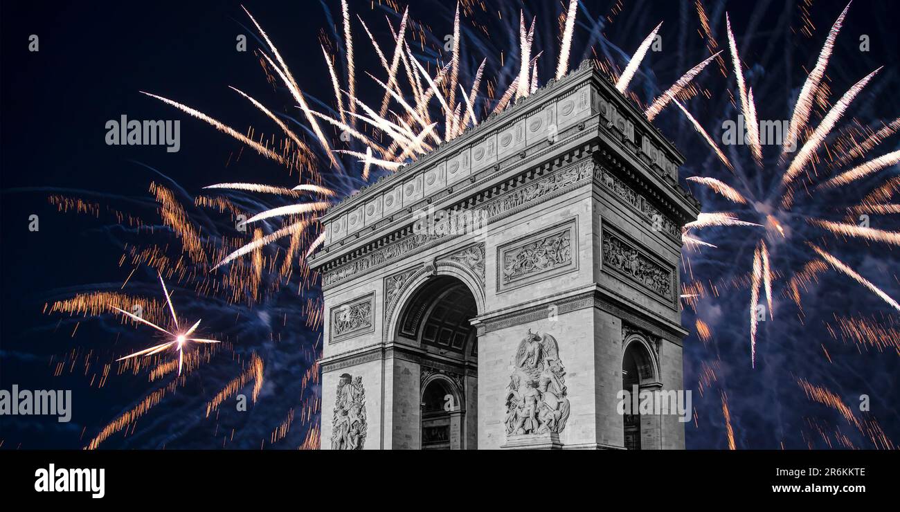 Celebratory colorful fireworks over the Arc de Triomphe, Paris, France ...