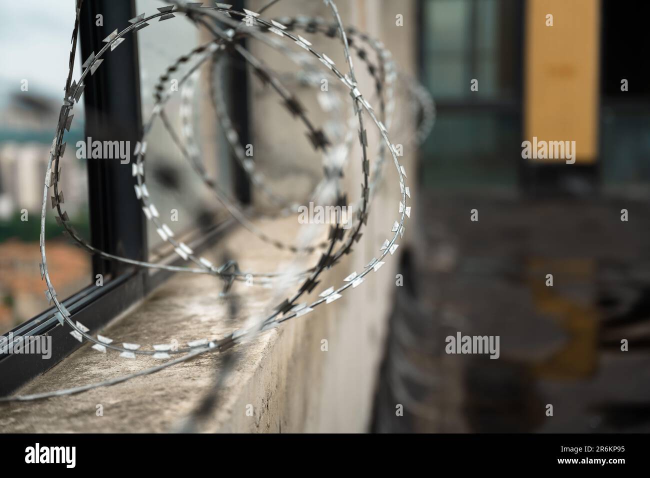 Protective netting above residential buildings Stock Photo - Alamy