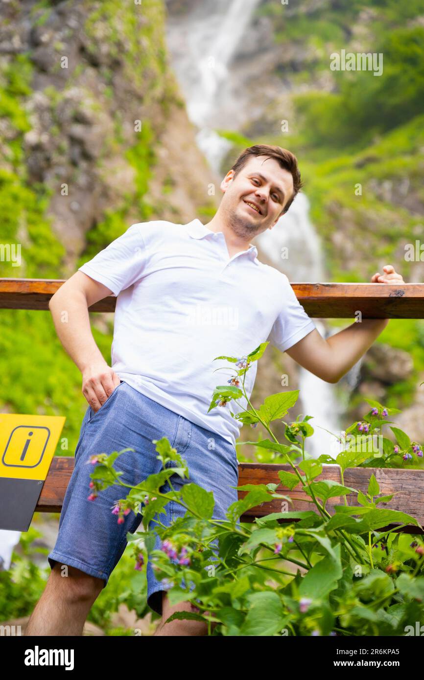 Male man on nature mountain waterfall. Young adult european caucasian ...