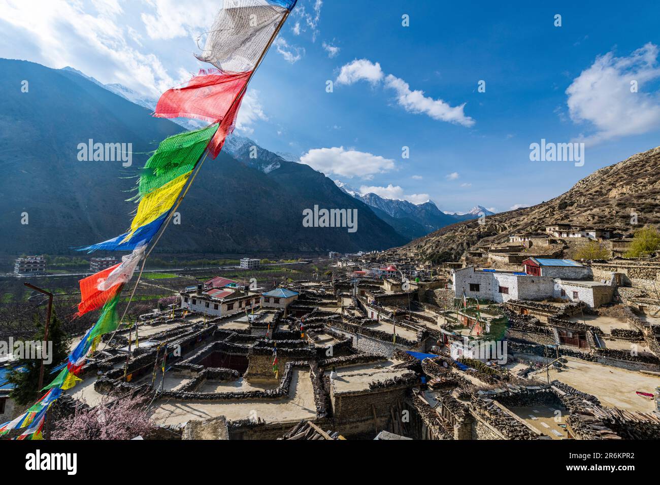 Historical village of Marpha and prayer flags, Jomsom, Himalayas, Nepal ...