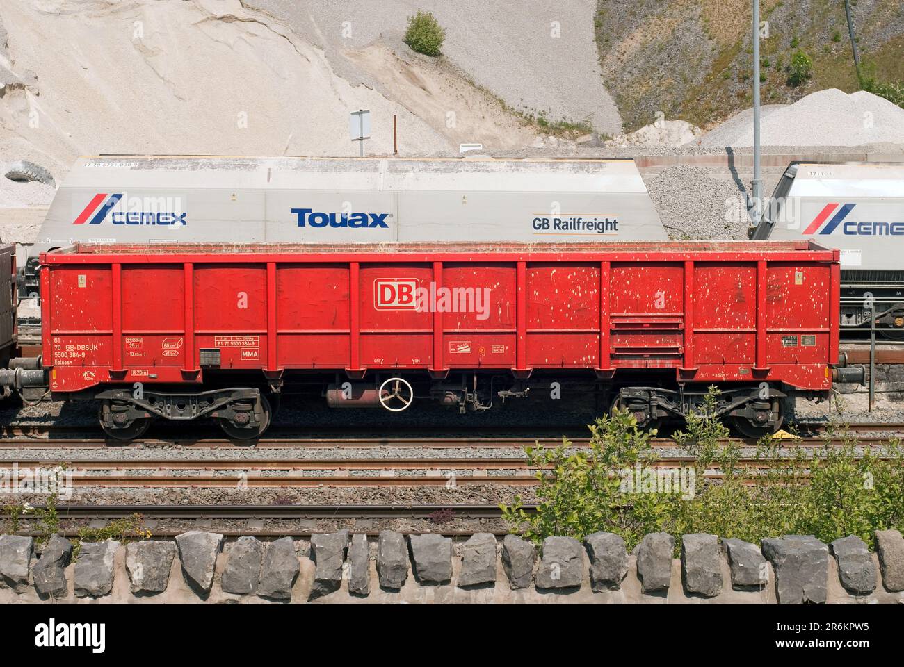 A DB Schenker branded railway mineral wagon at the Cemex quarry ...
