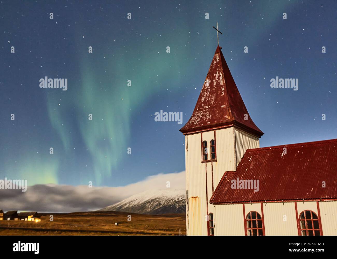 Night sky and Northern Lights (Aurora Borealis) over the church in the ...