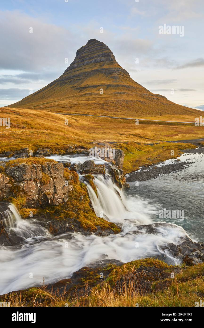Mount Kirkjufell and Kirkjufellsfoss Falls, near the port of ...