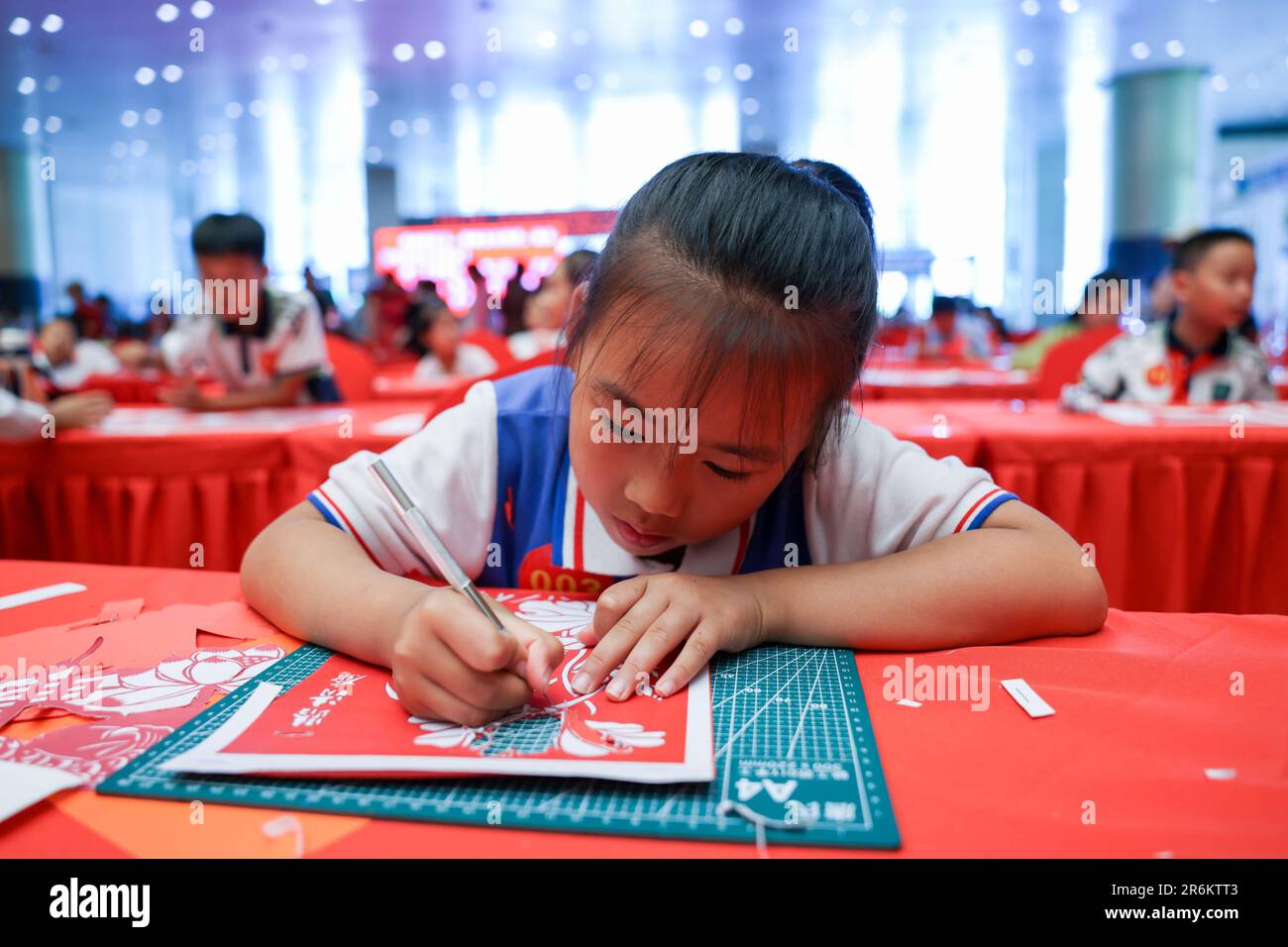 Jinan, China's Shandong Province. 10th June, 2023. A child makes paper ...