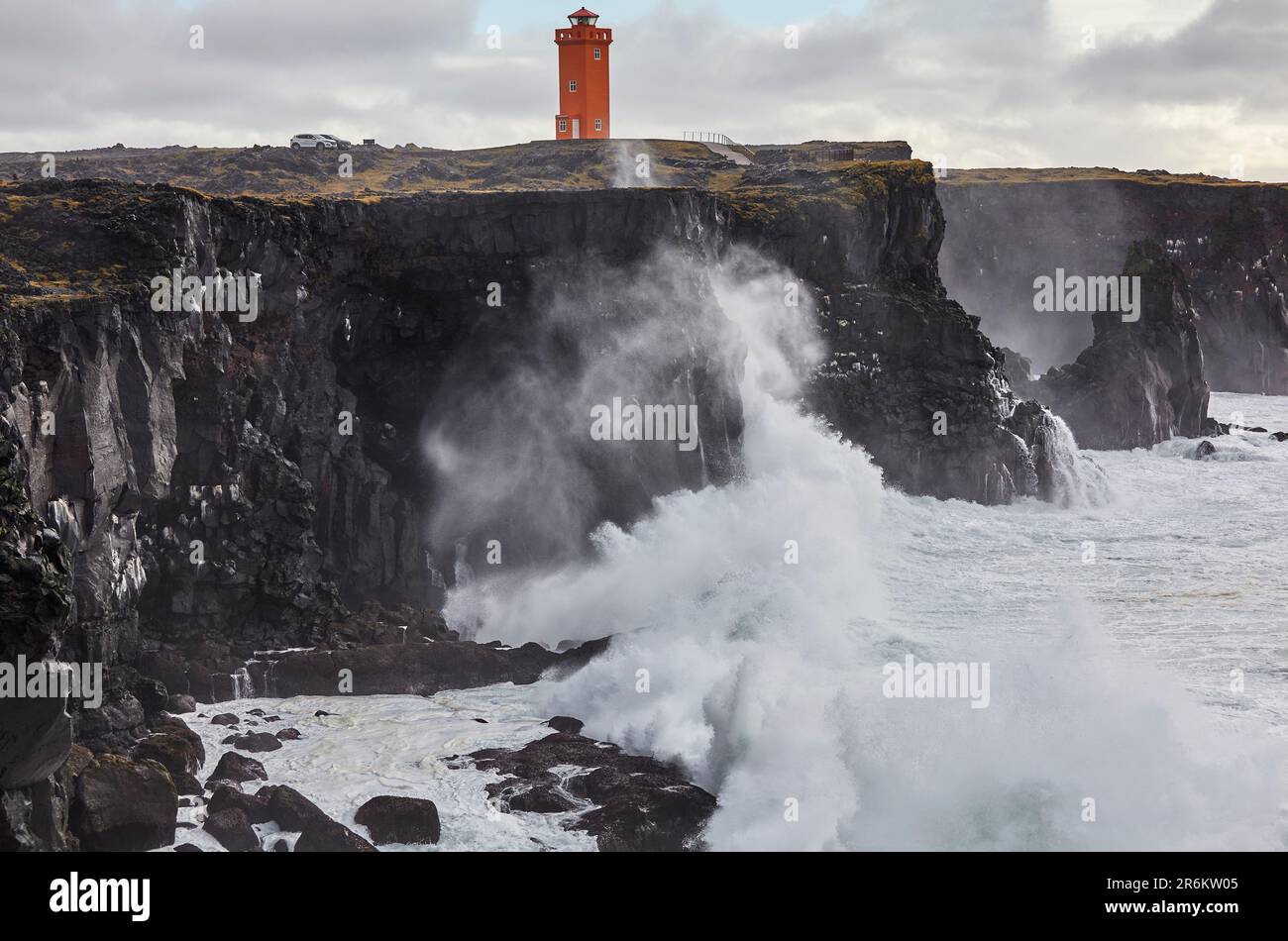 Storm surf against lava cliffs at Skalasnagi, in Snaefellsjokull ...
