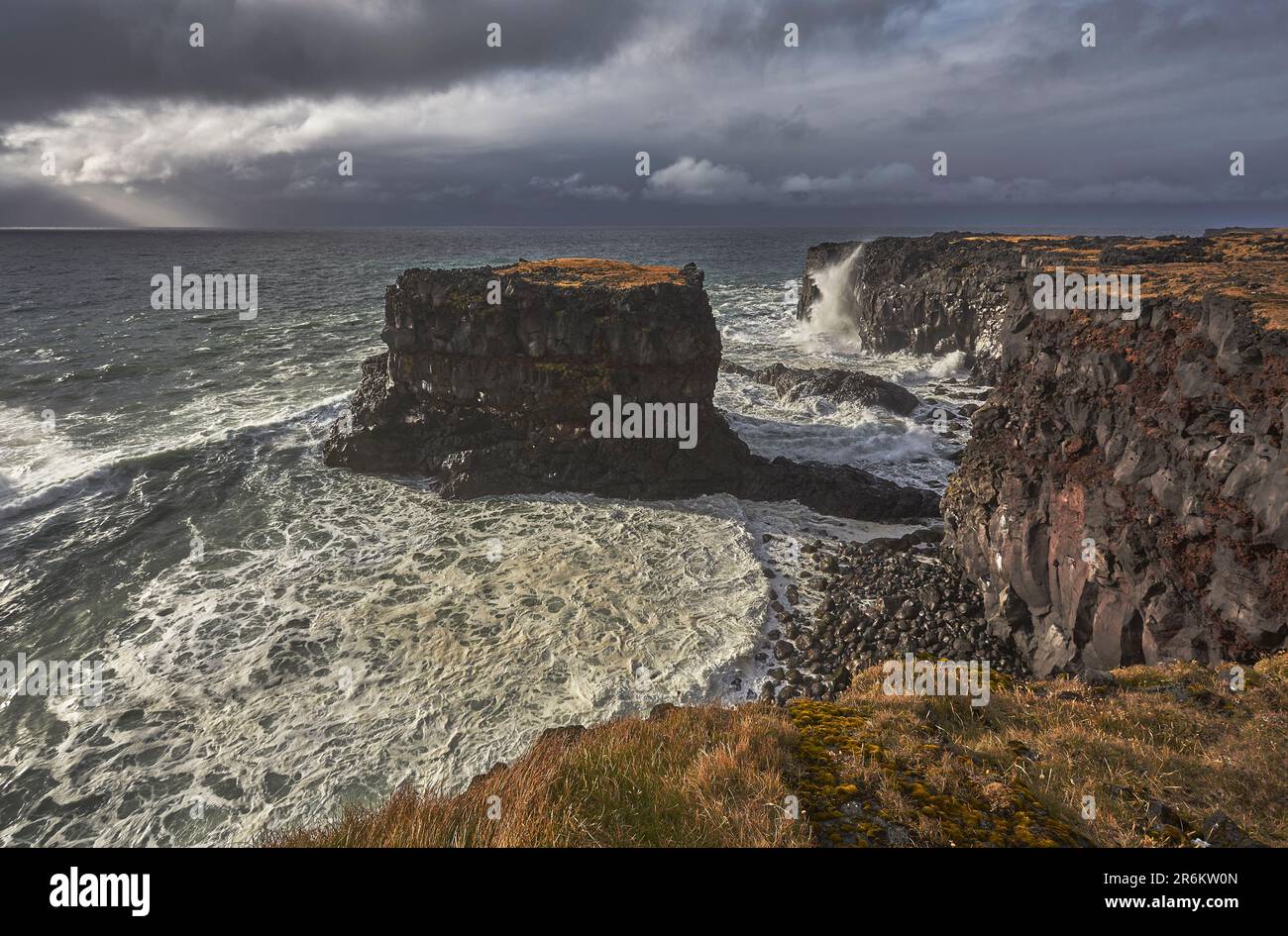 Storm surf against lava cliffs at Skalasnagi, in Snaefellsjokull ...
