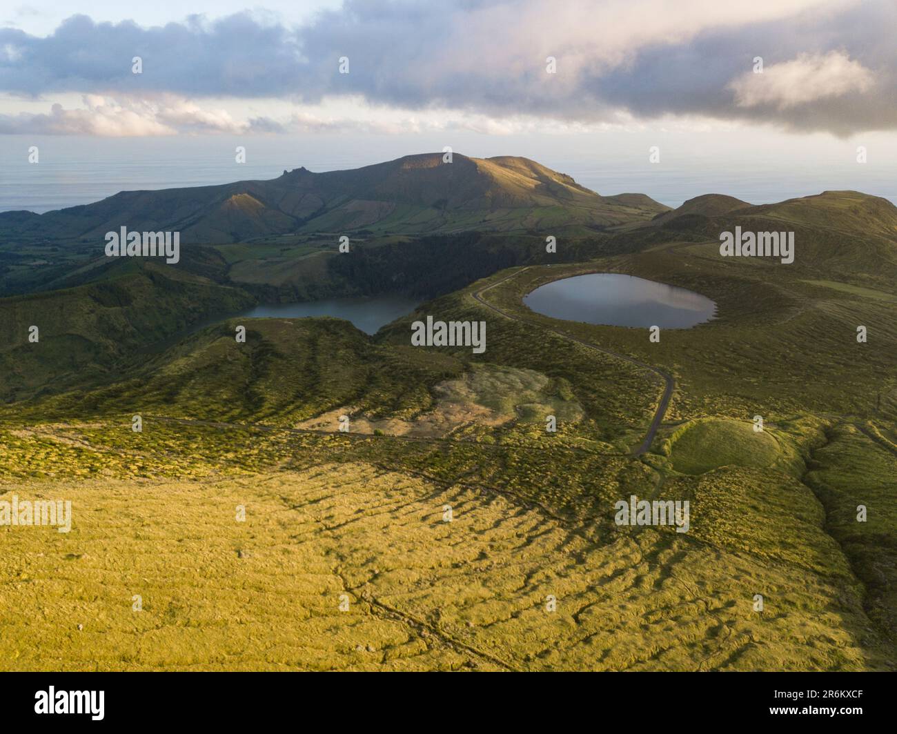 Aerial view of Caldeira Rasa lake on Flores Island at sunset, Azores ...
