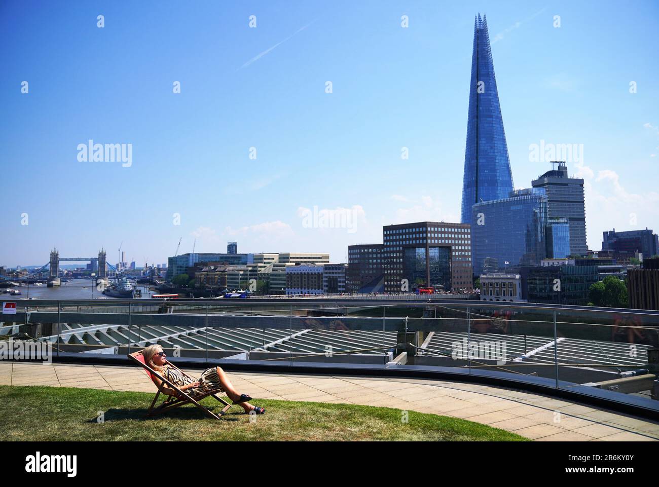 Rebecca Cooper from Colchester, Essex, relaxes in a sun chair in Nomura ...