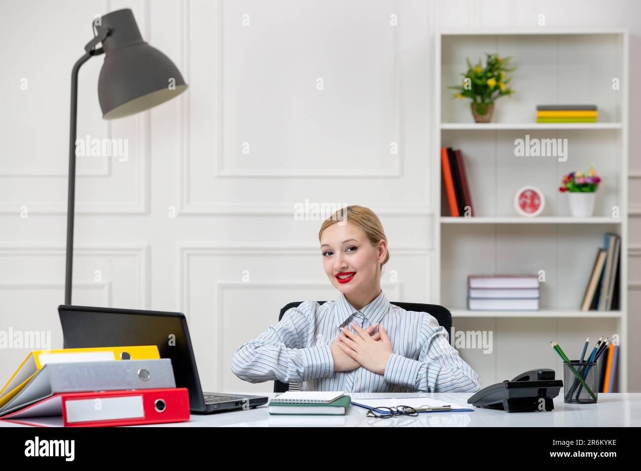 secretary lovely cute blonde young girl in shirt in office with work ...