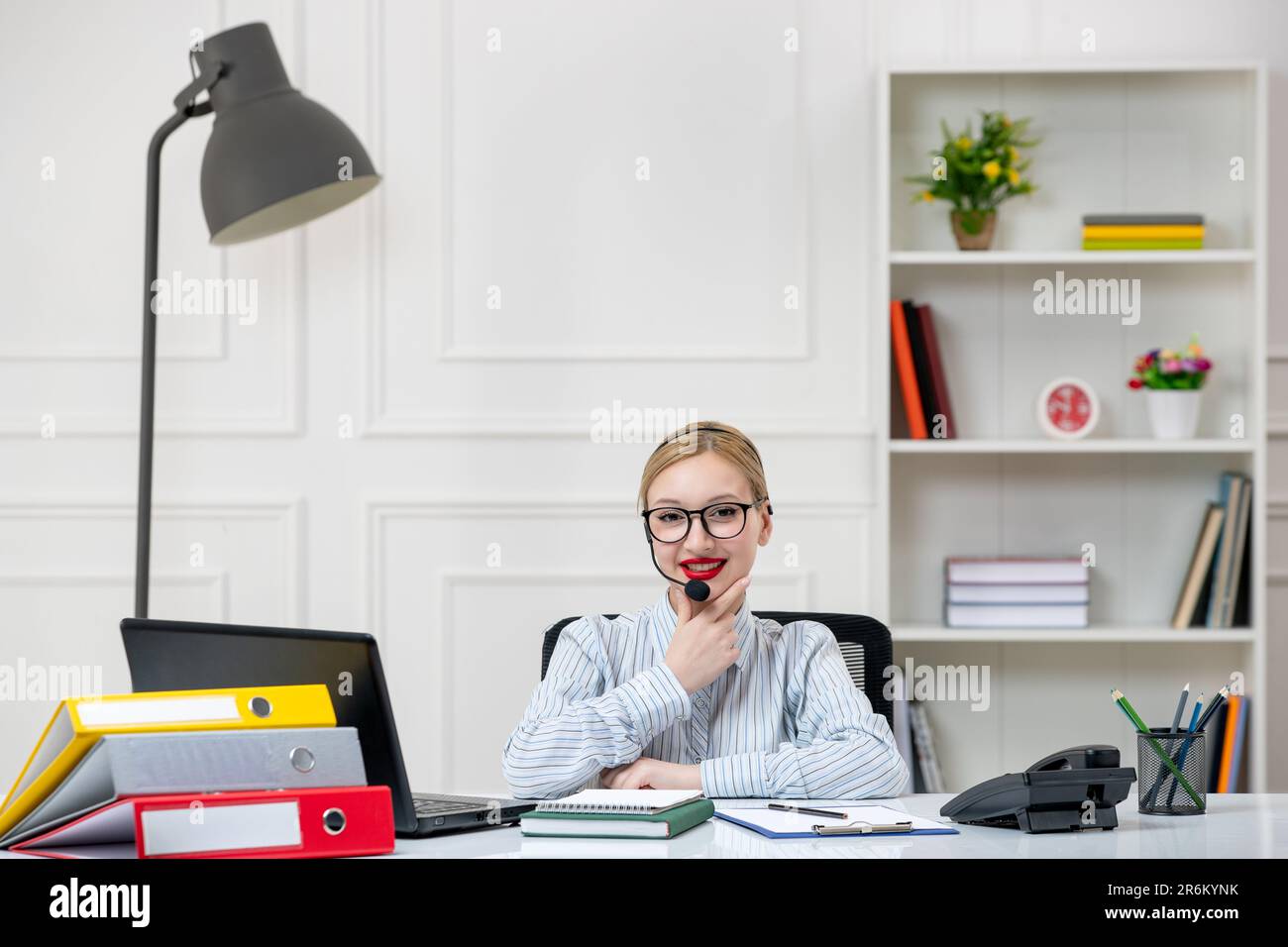 secretary lovely cute blonde young girl in shirt in office with work ...
