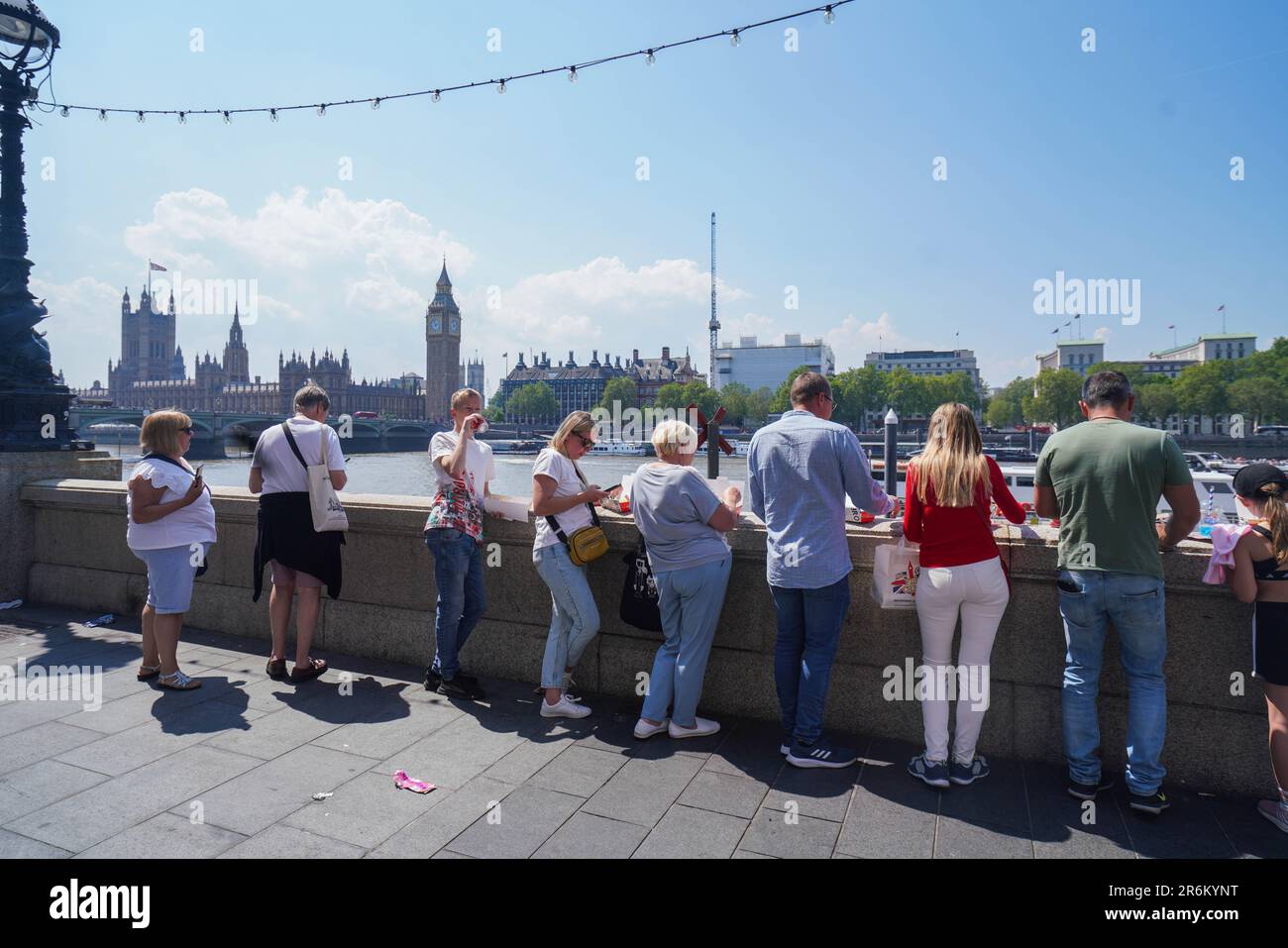 London UK. 10 June 2023 . Crowds of people out in the sunshine on the ...
