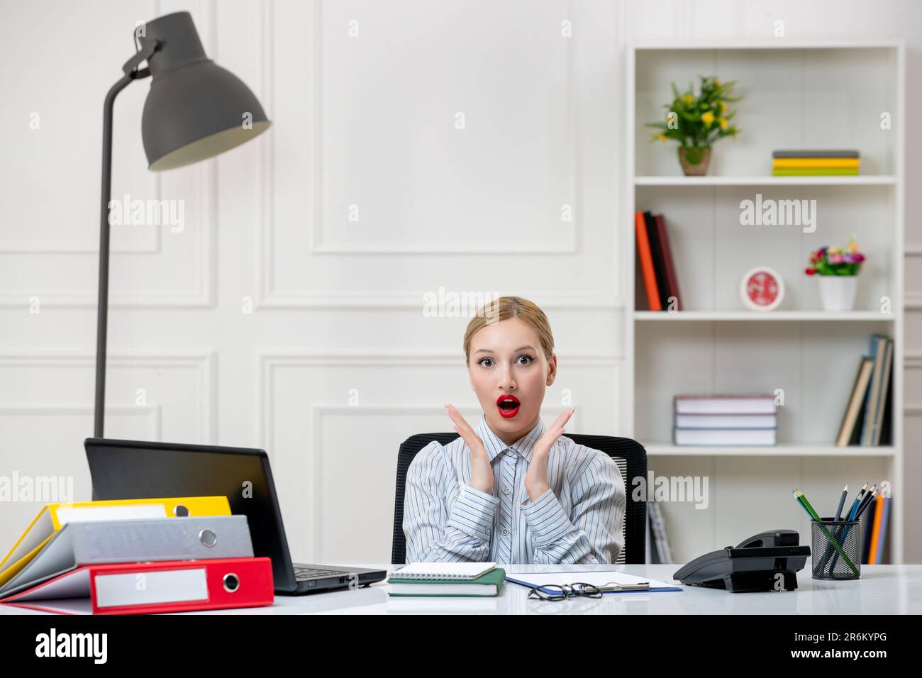secretary lovely cute blonde young girl in shirt in office with work ...