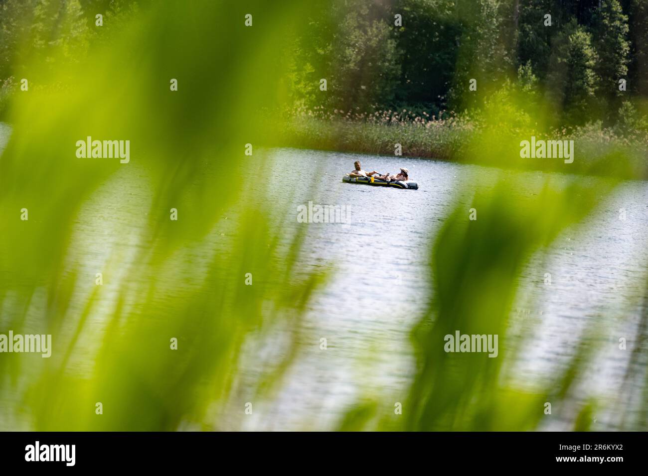 Two people in a dinghy hi-res stock photography and images - Alamy