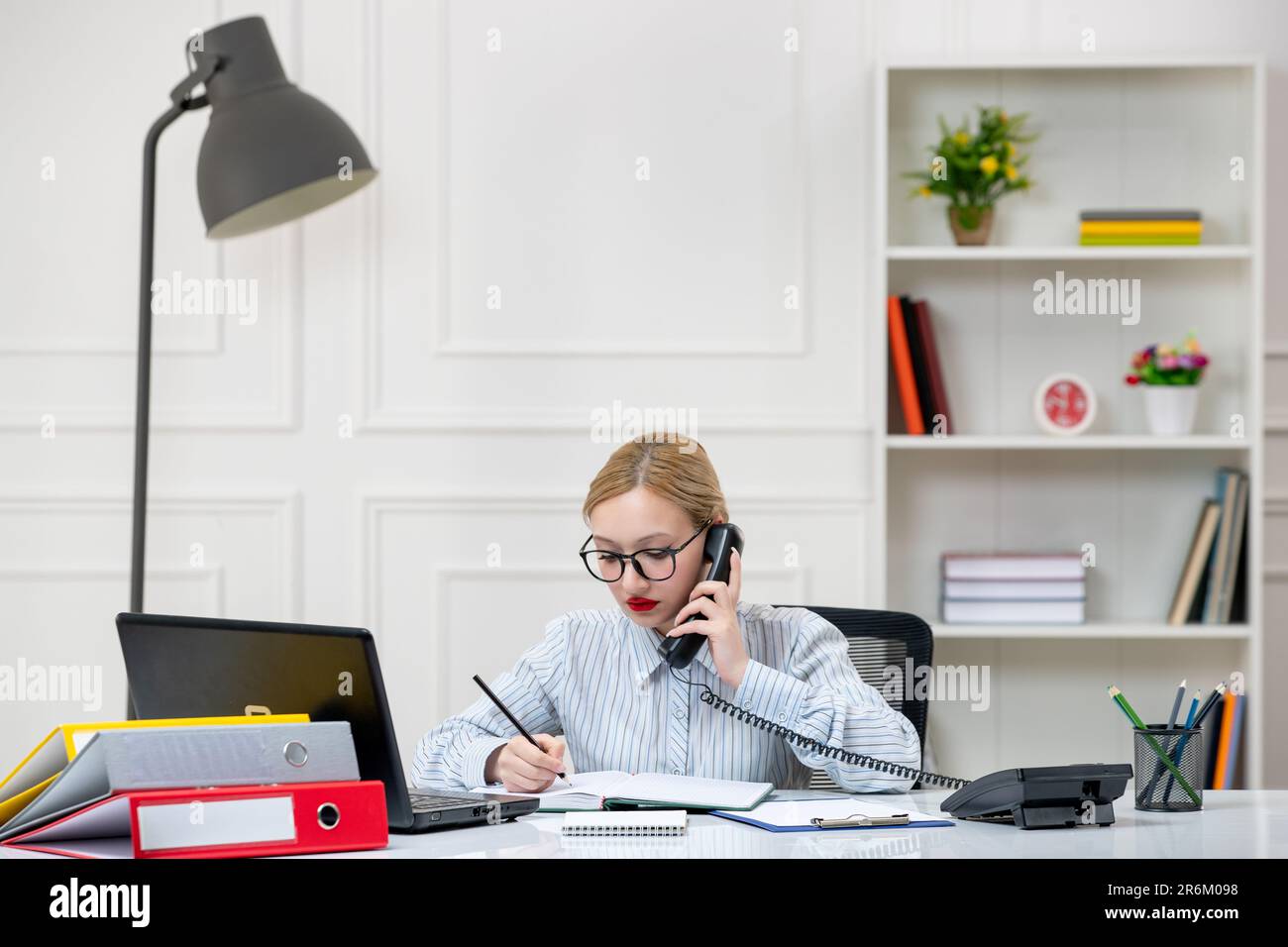 secretary working in office cute lovely young blonde girl in shirt with ...