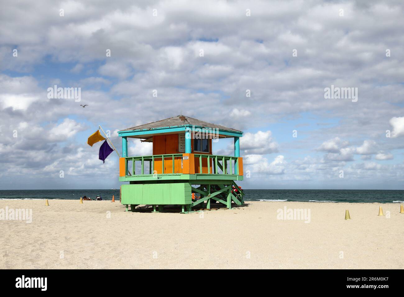 A traditional lifeguard house painted in an assortment of vibrant ...