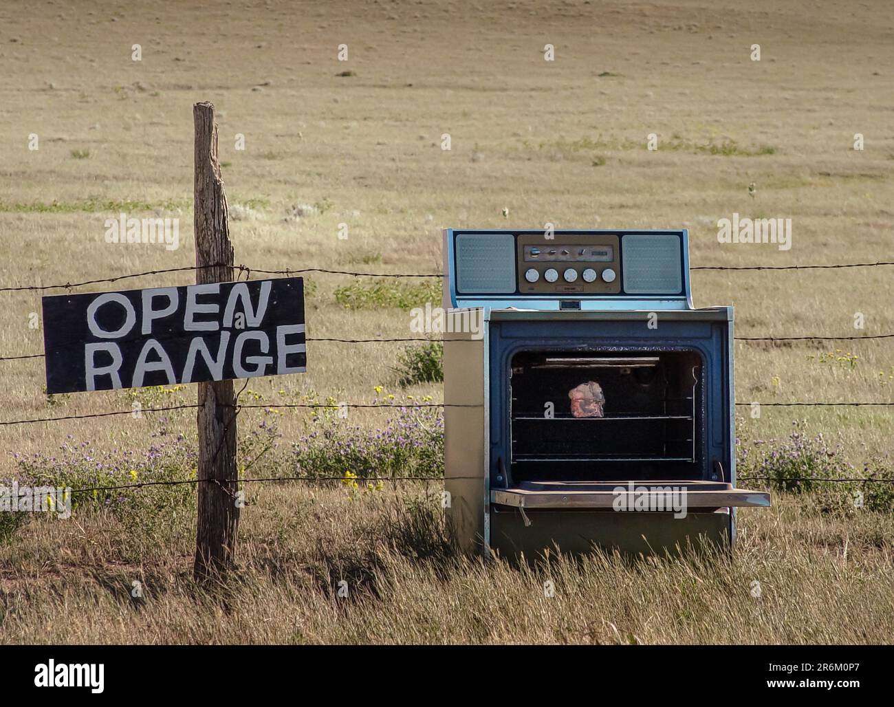 old kitchen stove with an open range sign Stock Photo - Alamy
