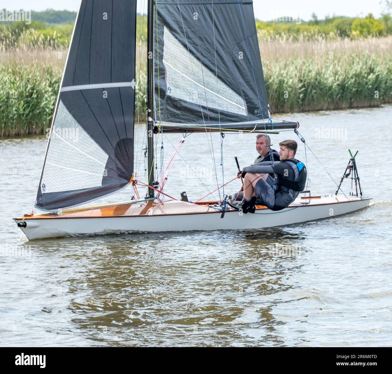 Horning, Norfolk, UK – June 03 2023. Two men competing in the Three ...