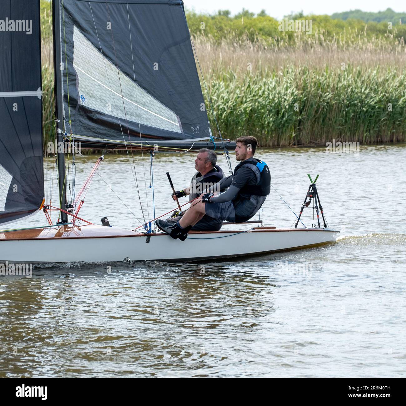 Horning, Norfolk, UK – June 03 2023. Two men competing in the Three ...