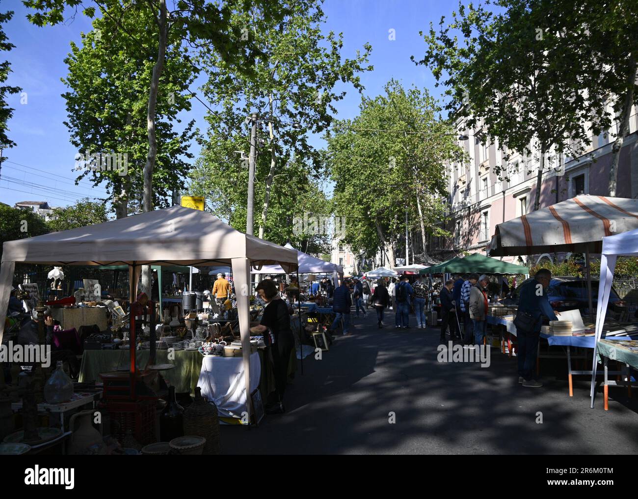 Antique and vintage items on display at an open-air flea market in ...