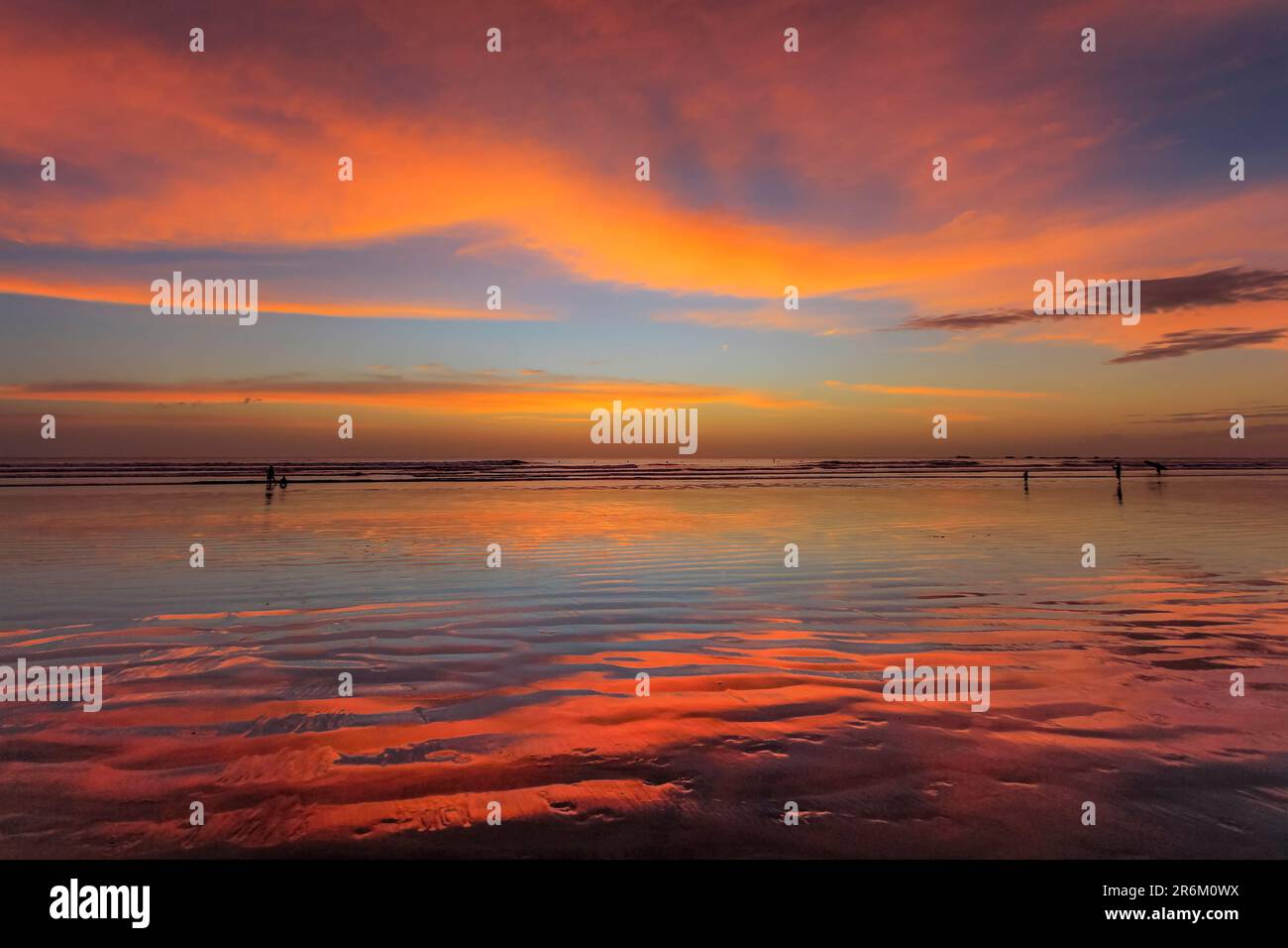 Sunset at Guiones Beach where hundreds of people gather to watch in ...