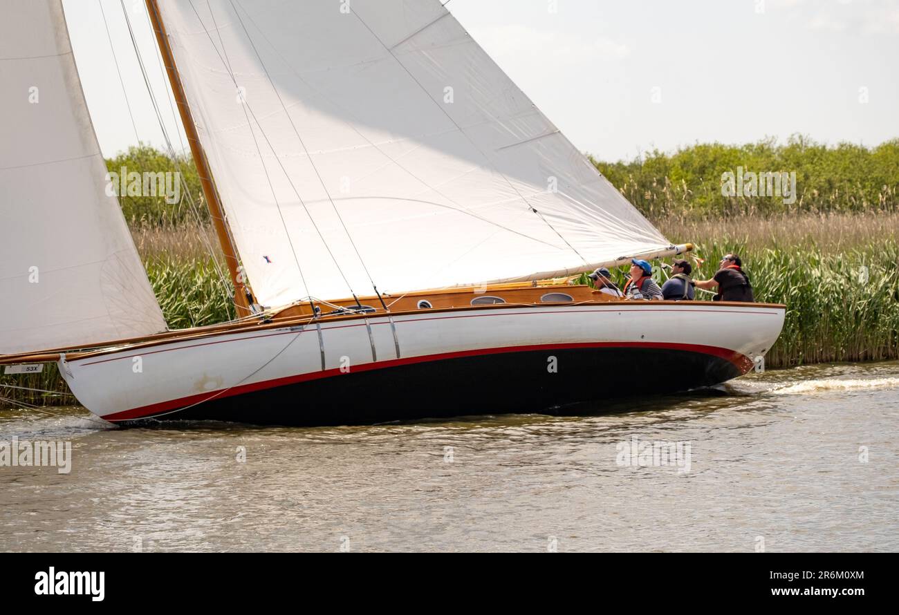 Horning, Norfolk, UK – June 03 2023. Wooden river cruiser keeled over ...
