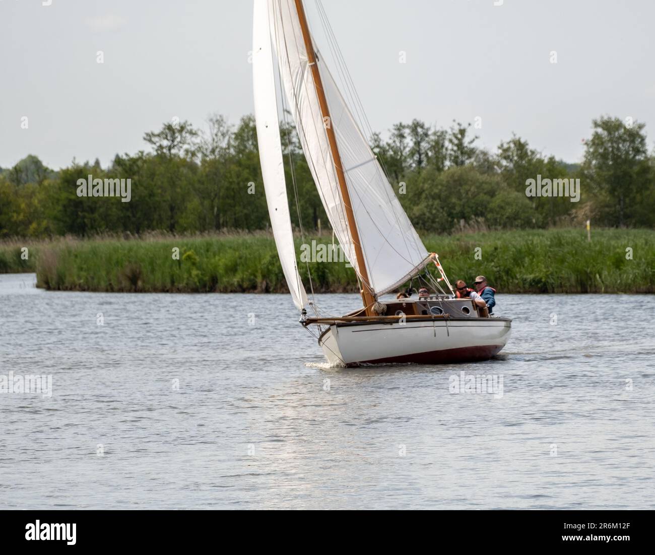 Horning, Norfolk, UK – June 03 2023. Cruiser sailboat competing in the ...