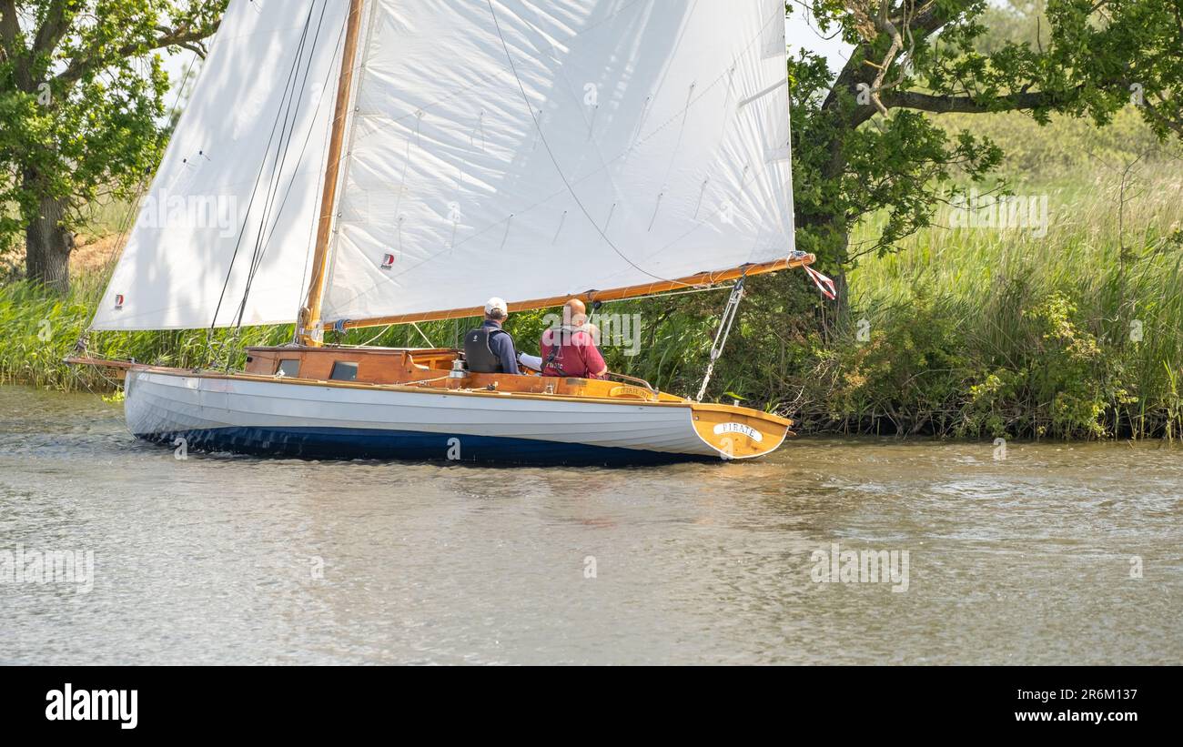 Wooden sailing boat on the River Bure, Norfolk Broads. Captured on a ...