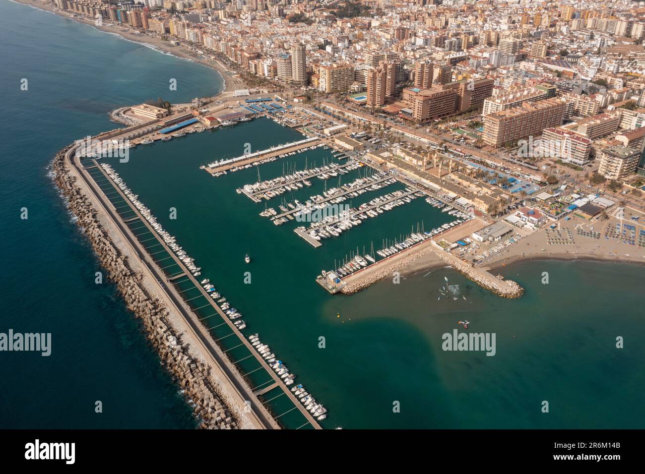 Aerial drone photo of the beautiful beach front of the coastal town of ...
