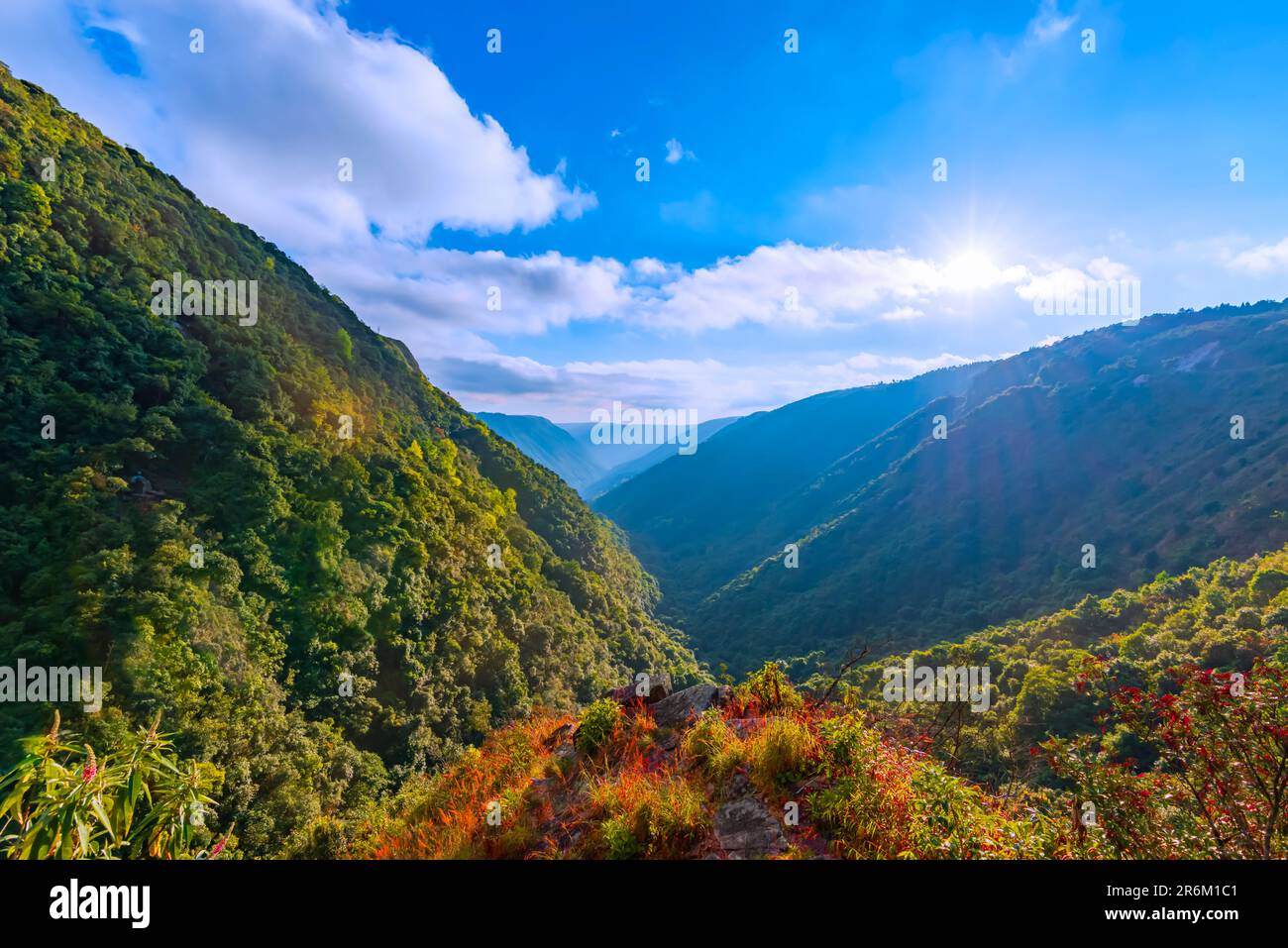 A view of the Mawkdok Dympep valley and its lush green mountain ...