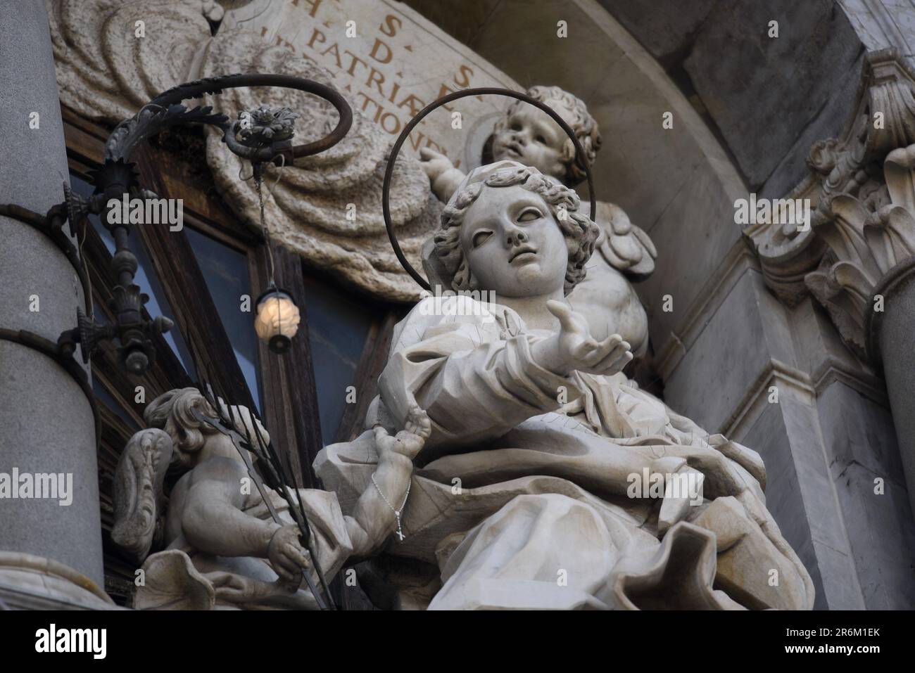Religious sculpture and symbols on the exterior of the Baroque style ...