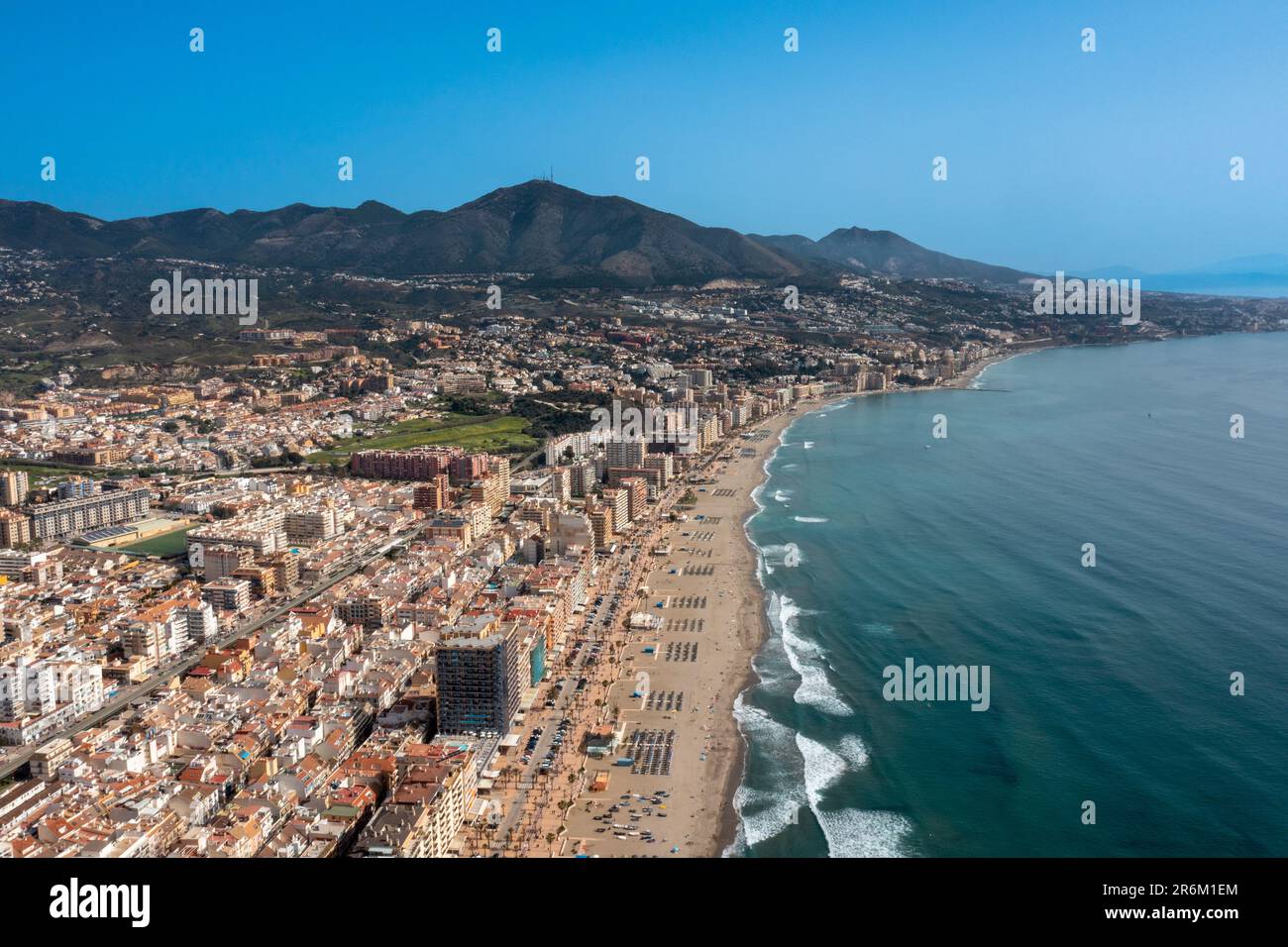 Aerial drone photo of the beautiful beach front of the coastal town of ...