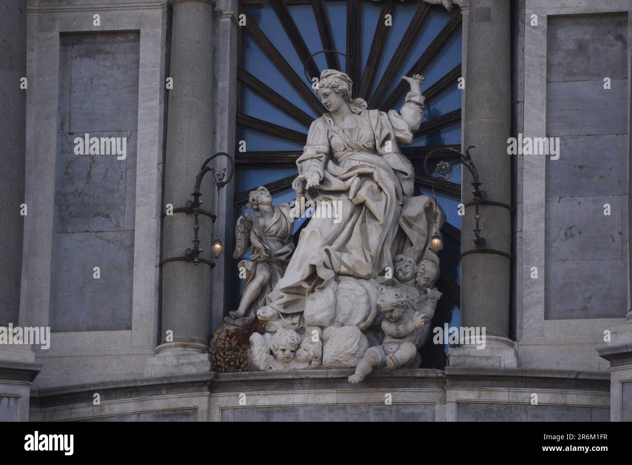 Religious sculpture and symbols on the exterior of the Baroque style ...