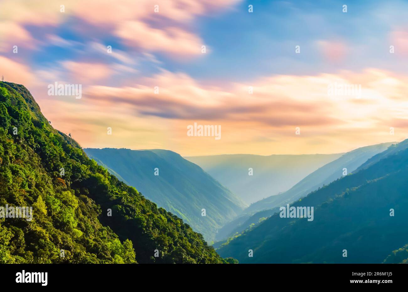 A view of the Mawkdok Dympep valley and its lush green mountain ...