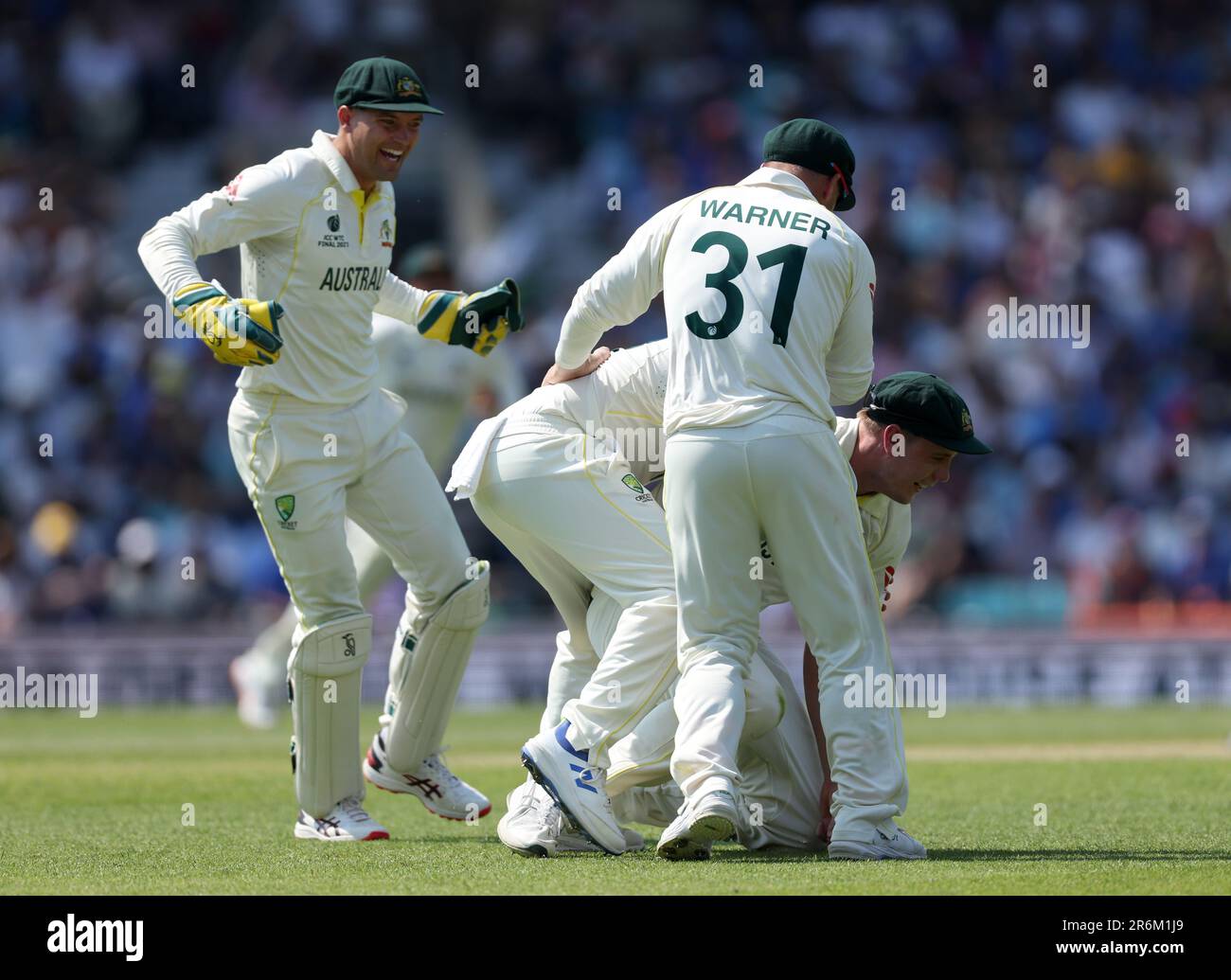 Australia's Cameron Green (right) celebrates catching India's Shubman ...