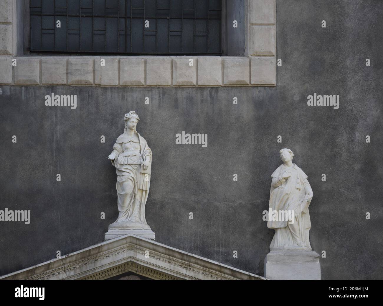 Marble sculptures on an archaic pediment in the historic center of ...