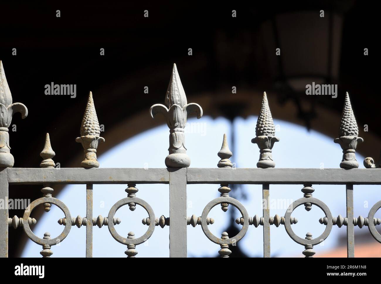 Handcrafted wrought iron entrance gate railing on the exterior of the ...