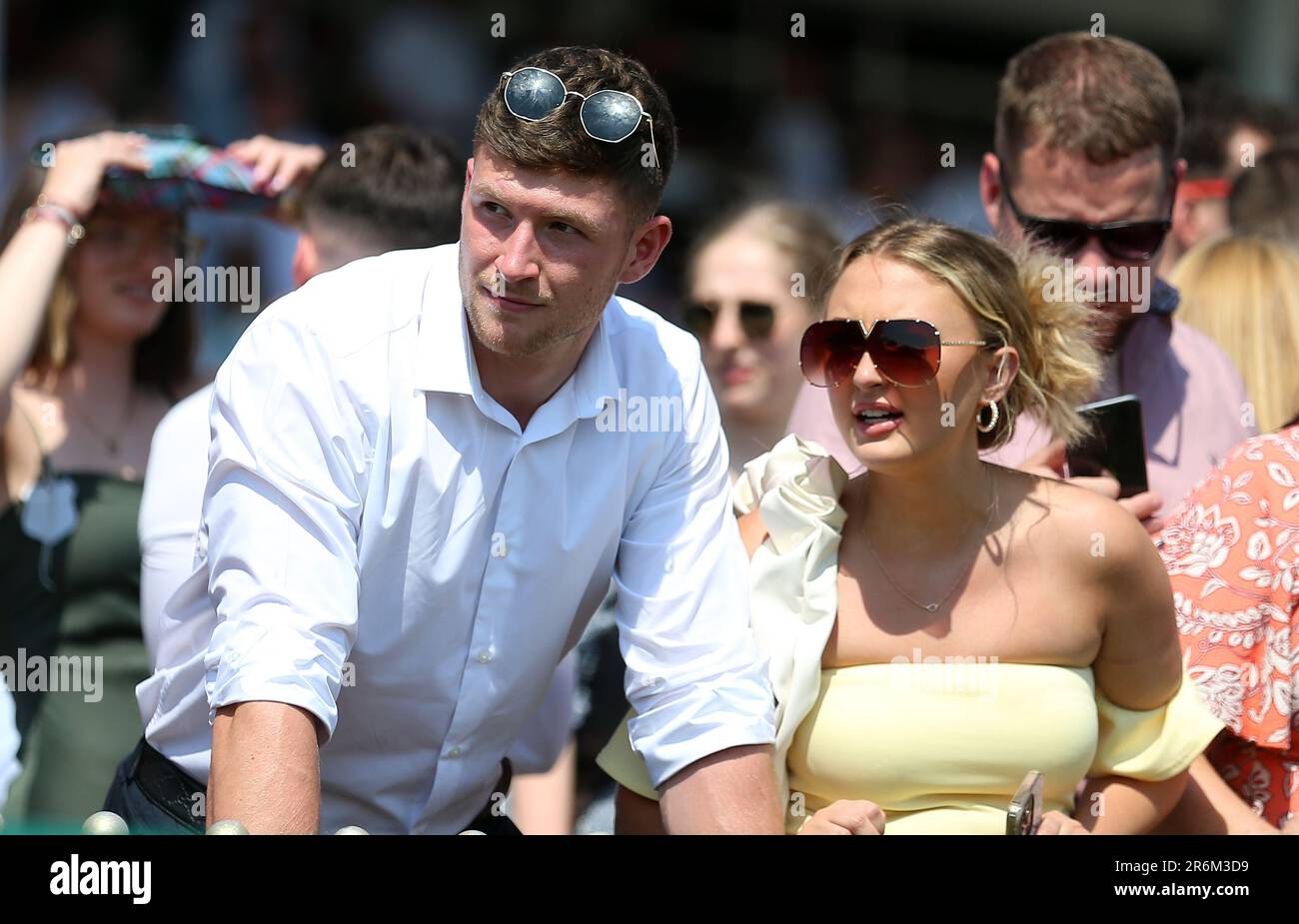 Racegoers at Haydock Park Racecourse, Merseyside. Picture date ...
