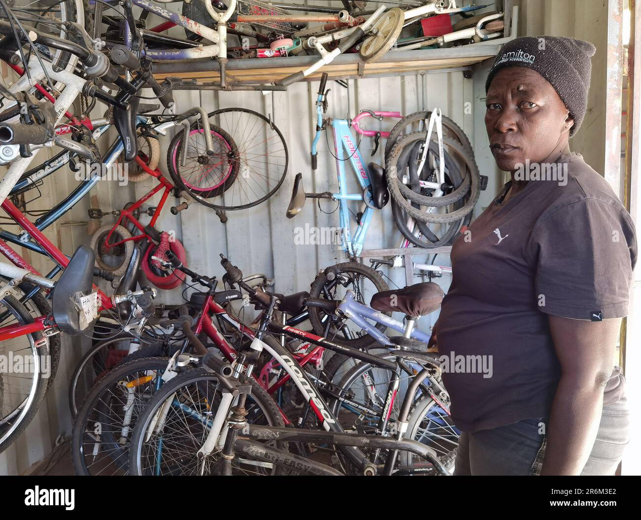 Windhoek, Namibia. 8th June, 2023. Hileni Simeon, a bicycle mechanic ...