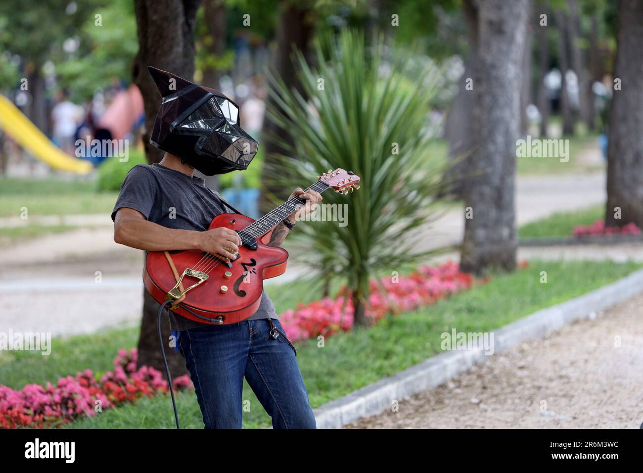 Masked guitarist hi-res stock photography and images - Alamy