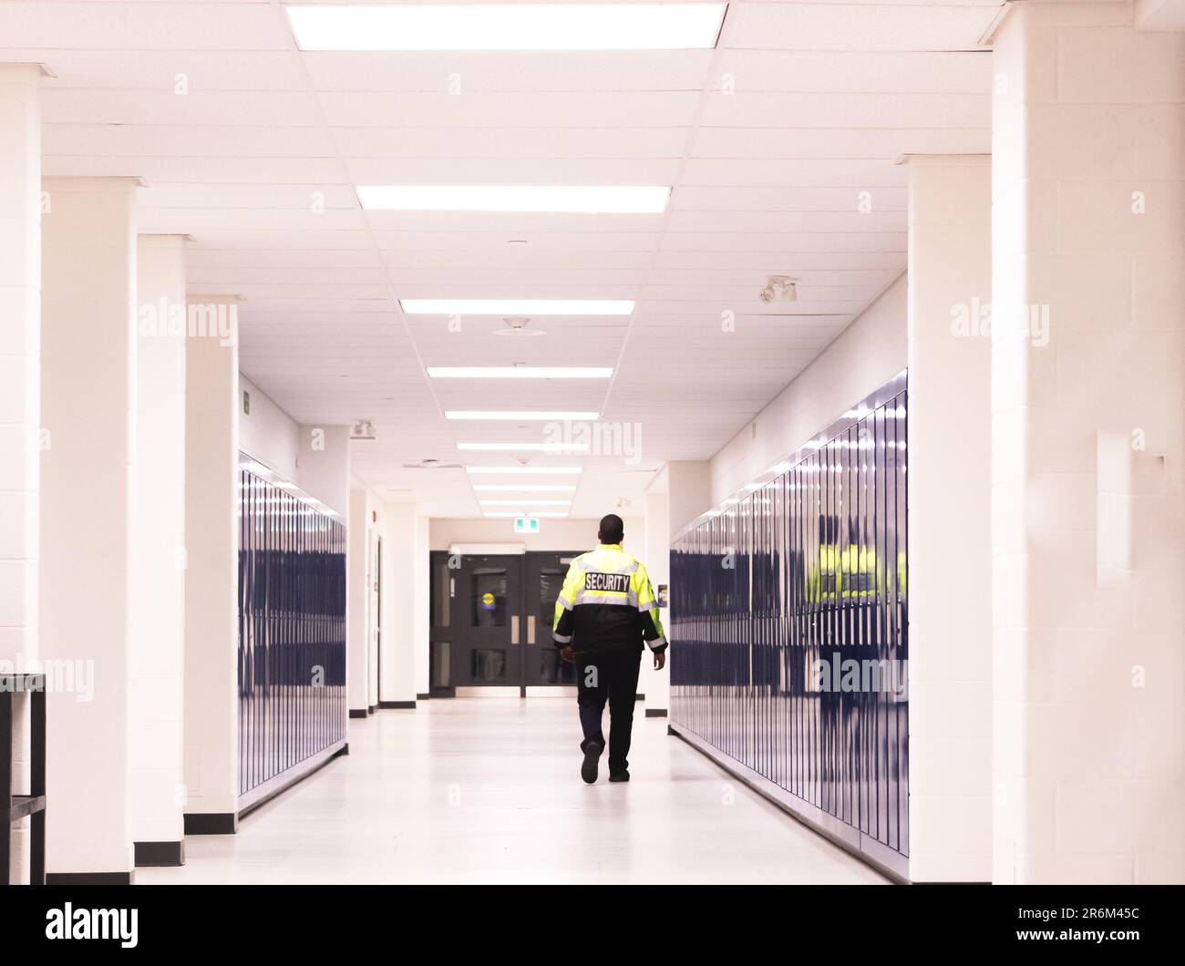Security guard patrolling at school Stock Photo - Alamy