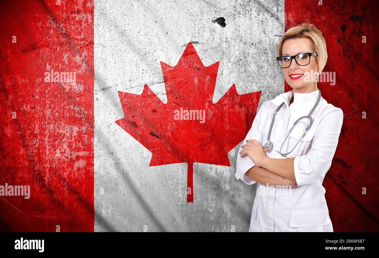 female doctor with stethoscope on canada flag background Stock Photo ...