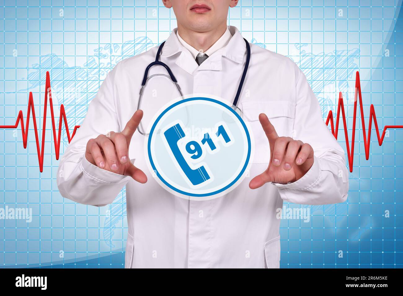 Young doctor with stethoscope holding 911 symbol Stock Photo - Alamy