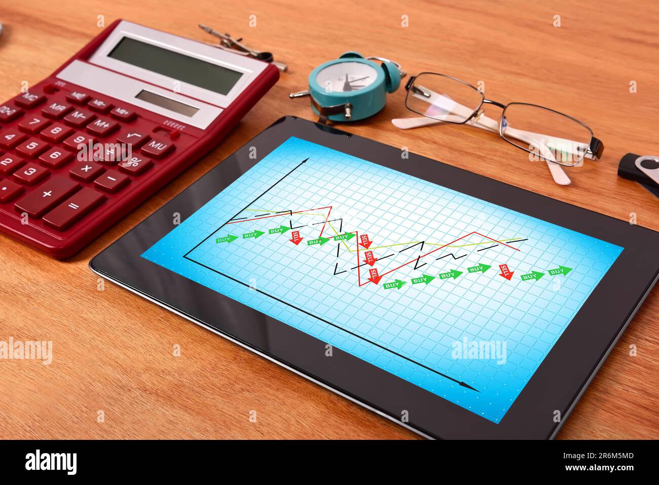 Tablet pc with stock chart on screen Stock Photo - Alamy