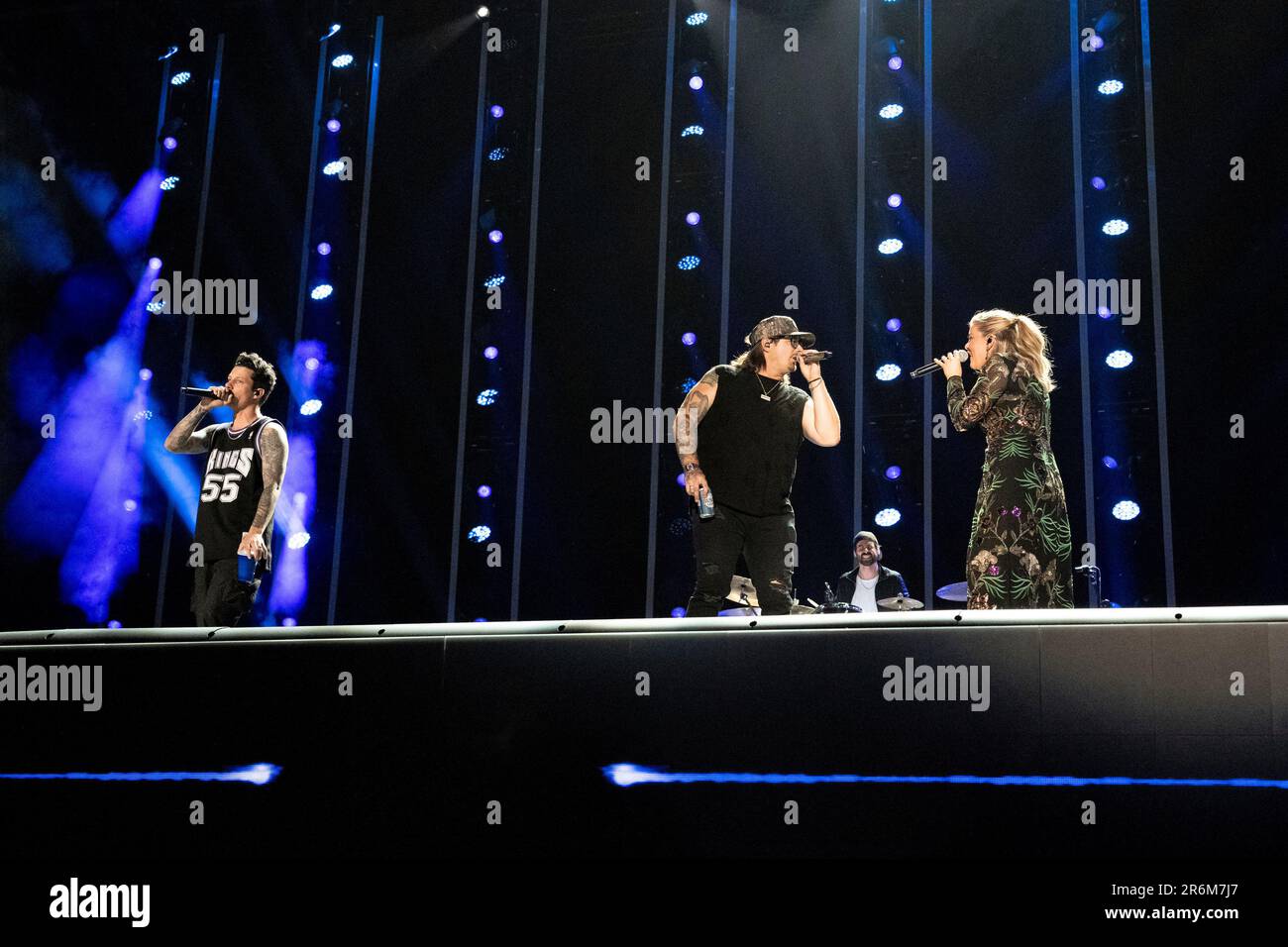 Devin Dawson, left, HARDY and Lauren Alaina perform during the 2023 CMA ...